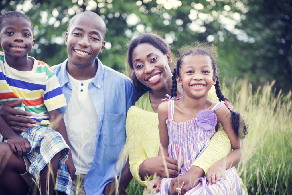African Family Happiness Holiday Vacation Activity Concept - Jay Harold